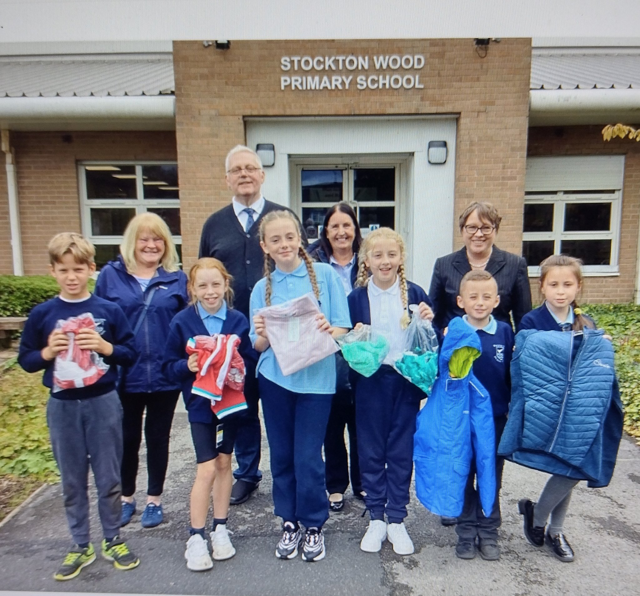 Councillors donate clothing - Stockton Wood Primary School